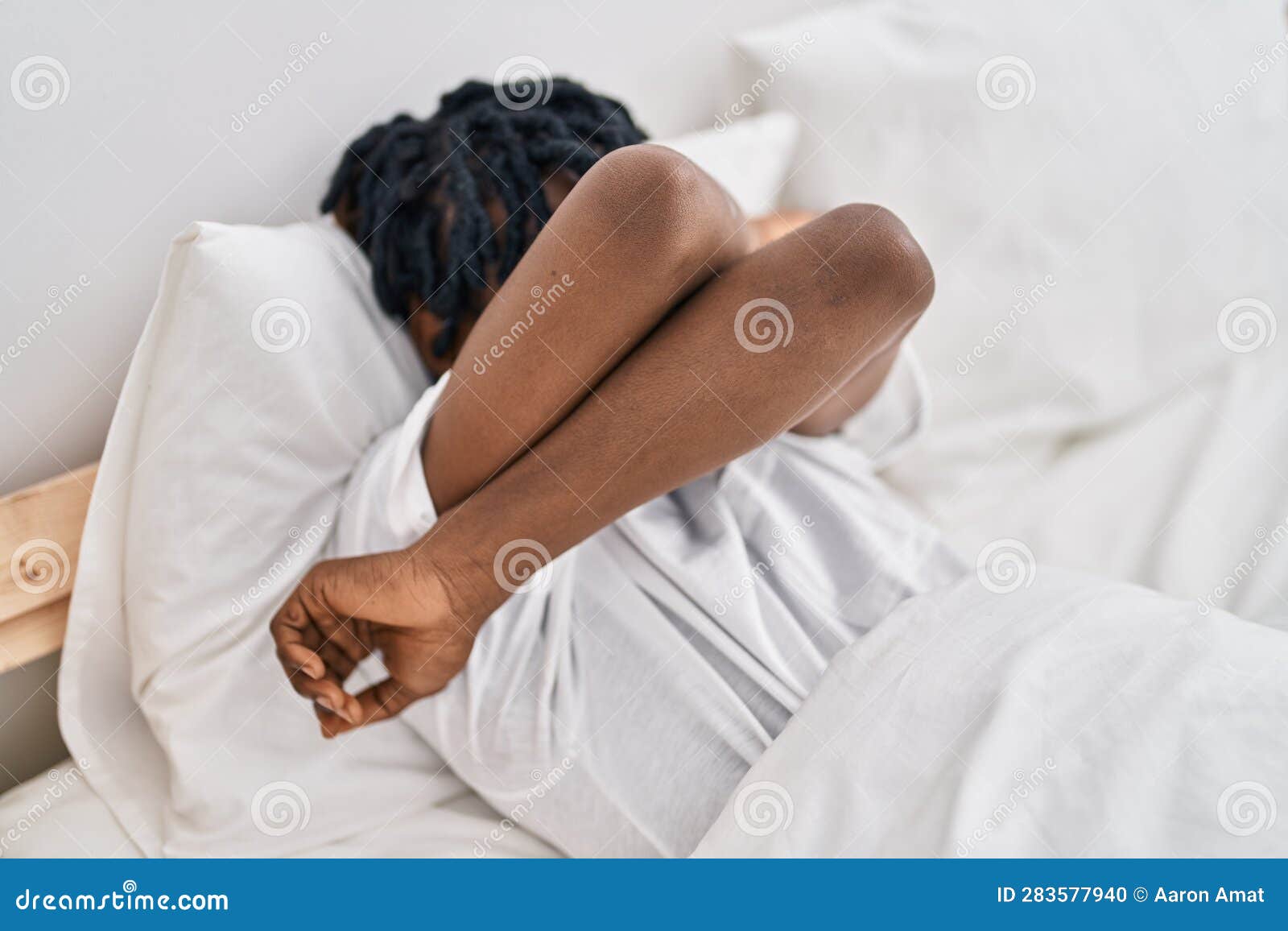 African American Man Lying on Bed Crying at Bedroom Stock Photo - Image ...