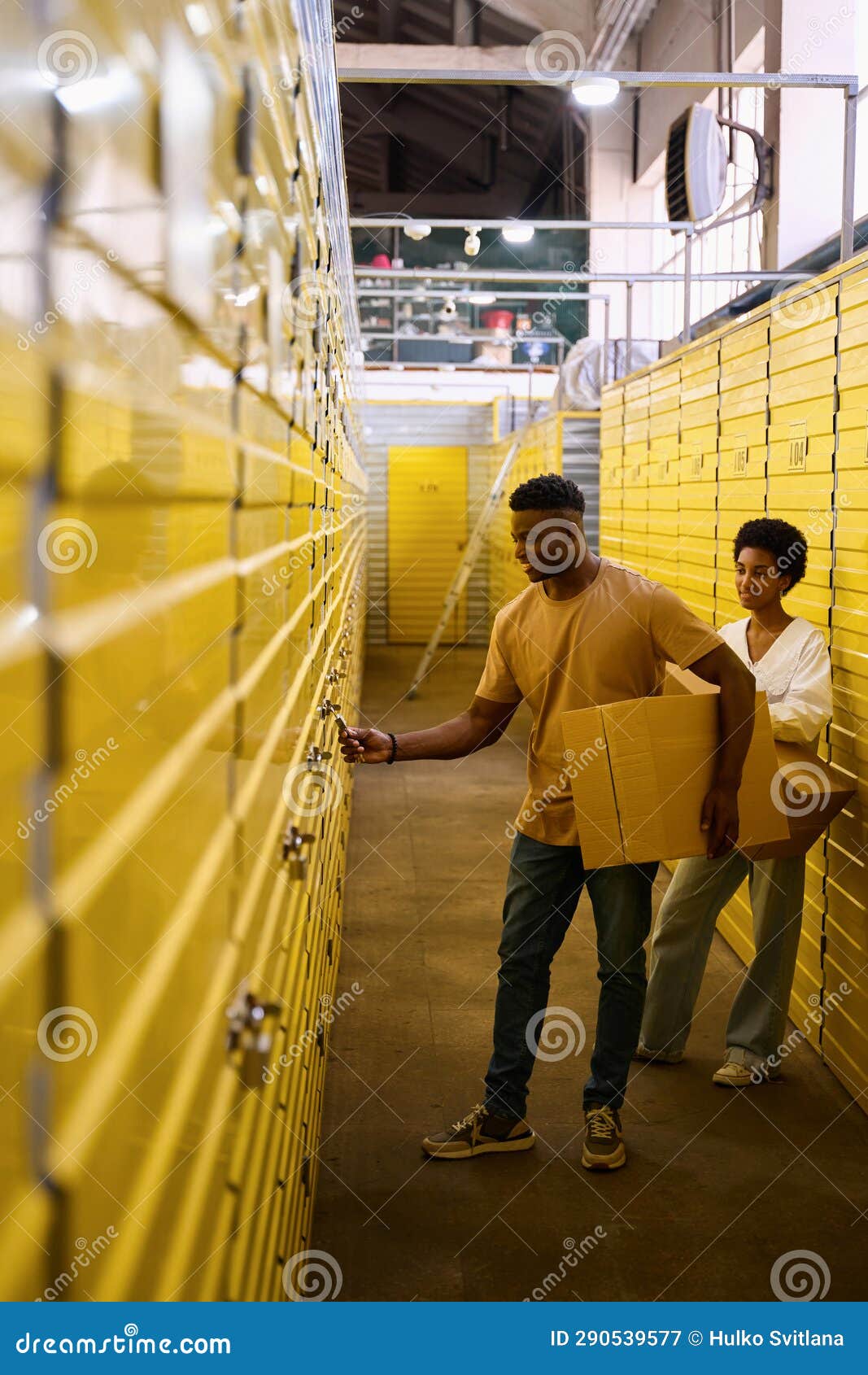 African American Man Opens a Storage Unit Stock Image - Image of ...
