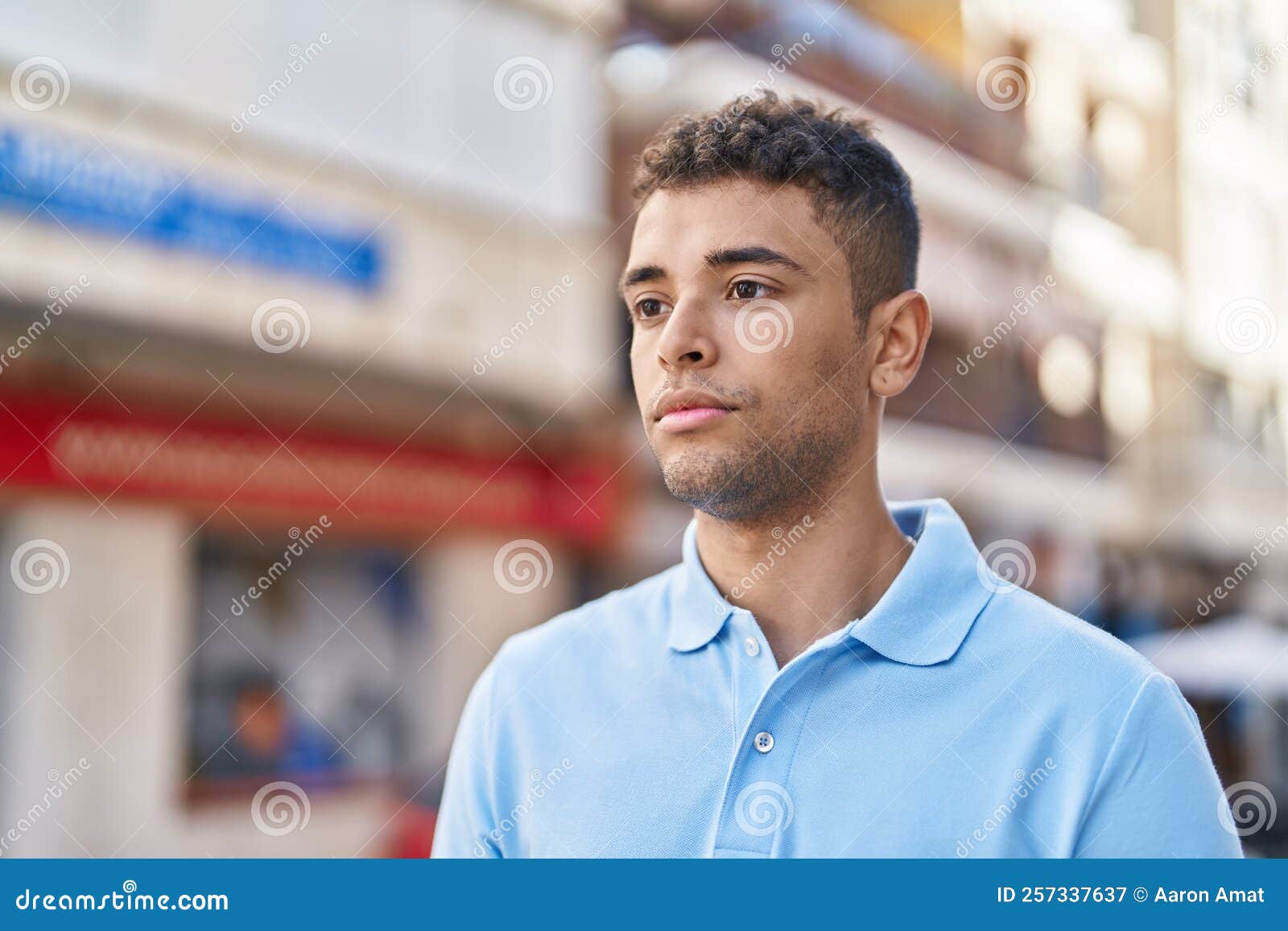 African American Man with Relaxed Expression Standing at Street Stock ...
