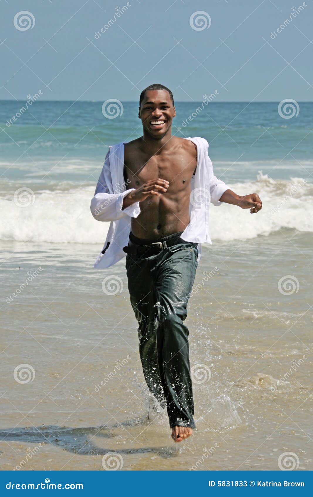 African American Man Running in the Surf Stock Image - Image of cute ...