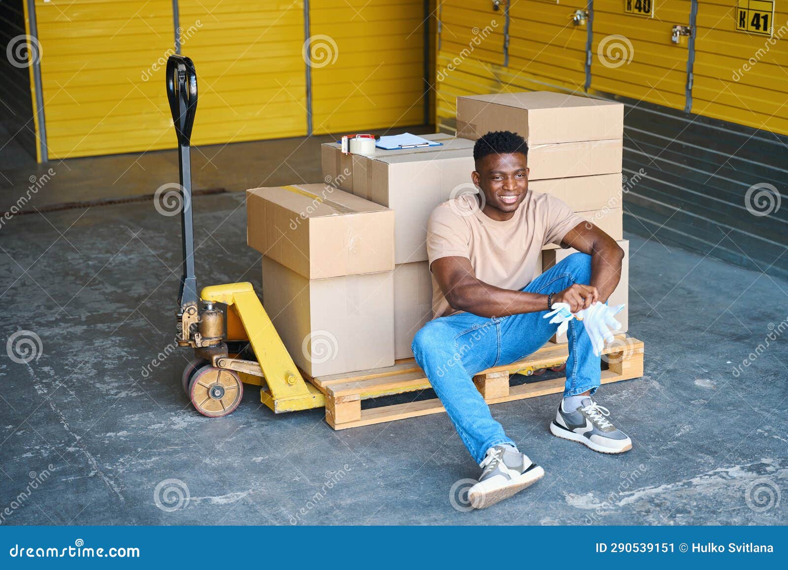 African American Man Sat Down To Rest on Cargo Cart Stock Image - Image ...