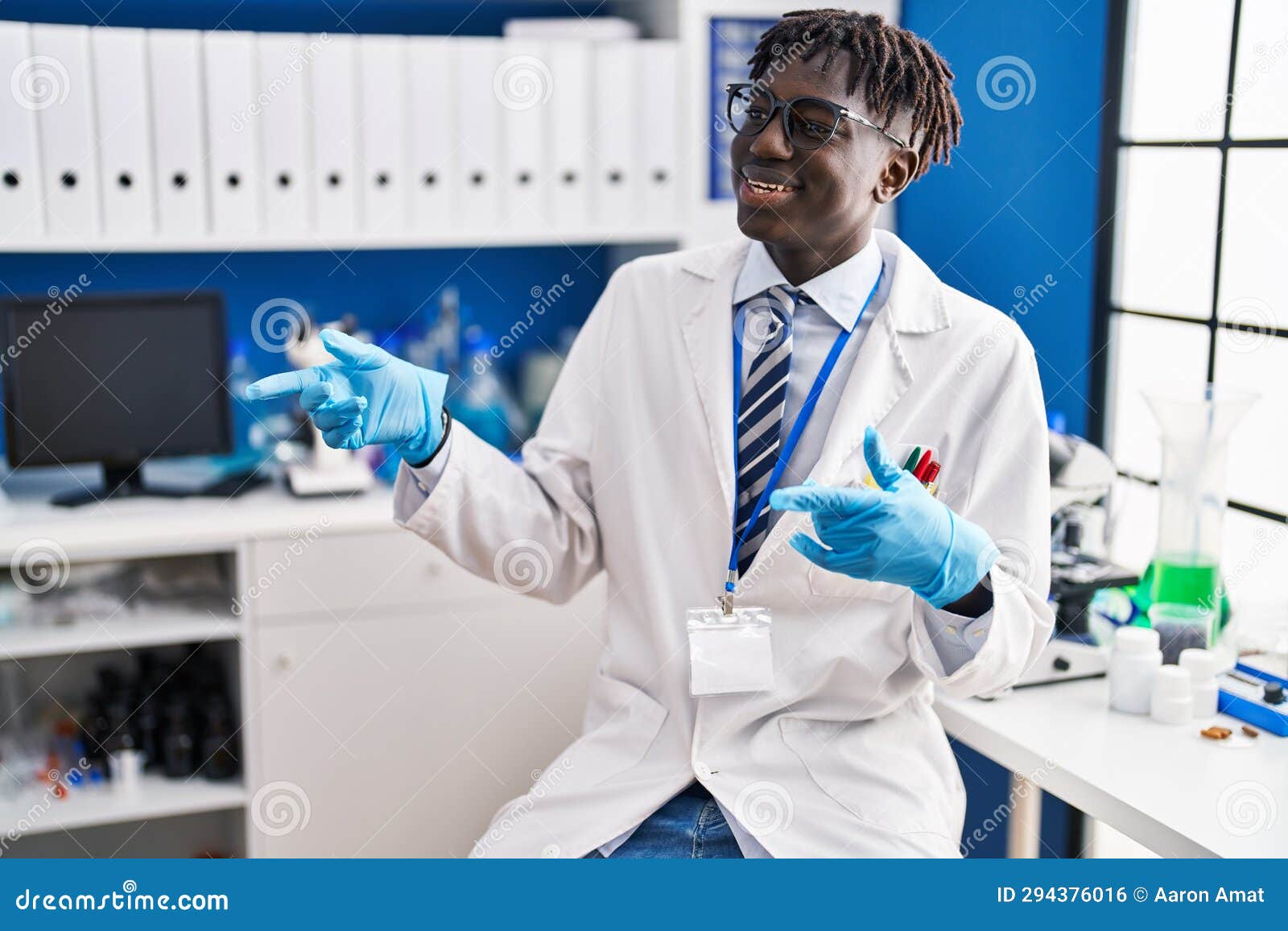 African American Man Scientist Smiling Confident Speaking at Laboratory ...