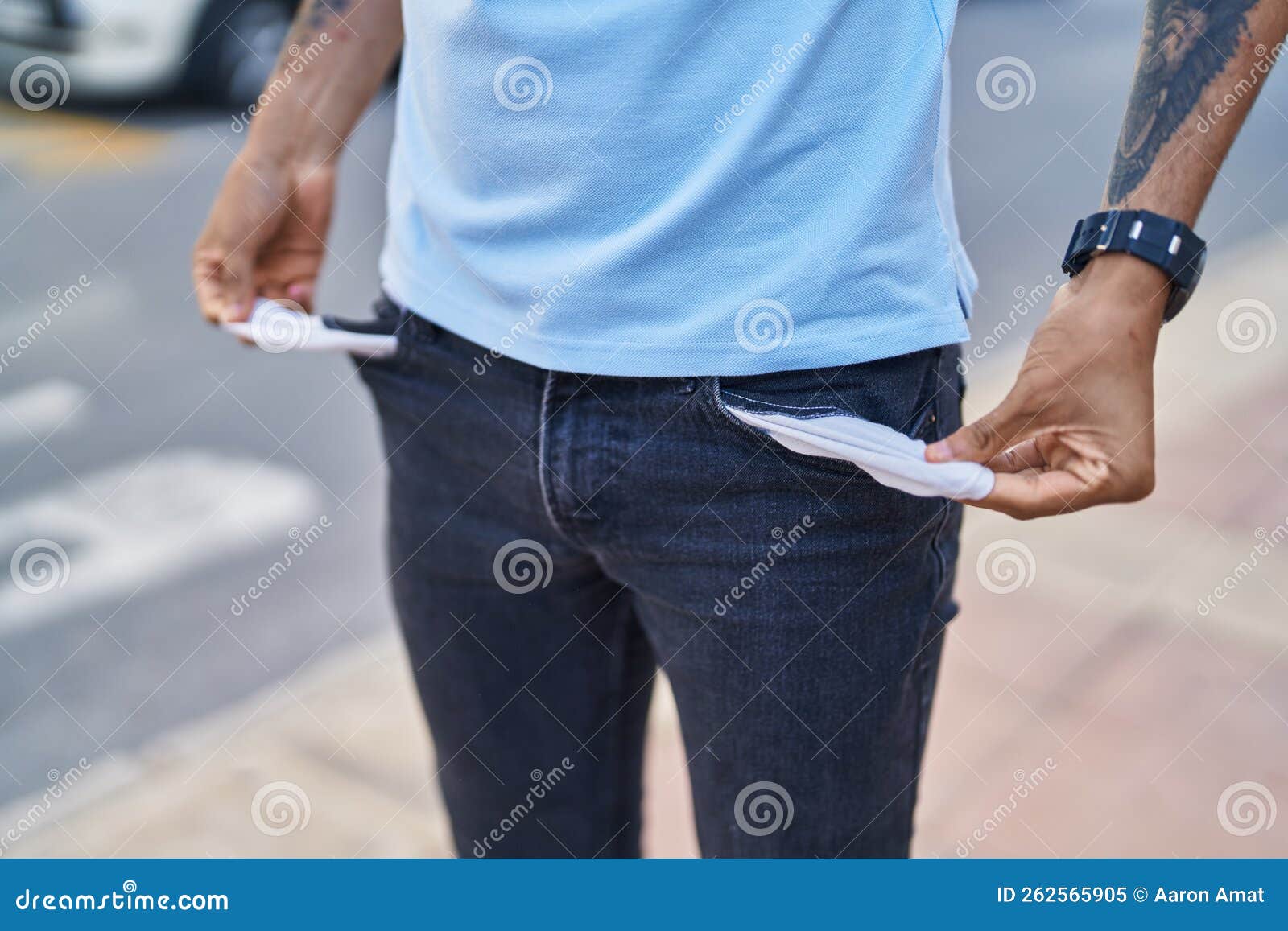 African American Man Showing Empty Pockets at Street Stock Image ...