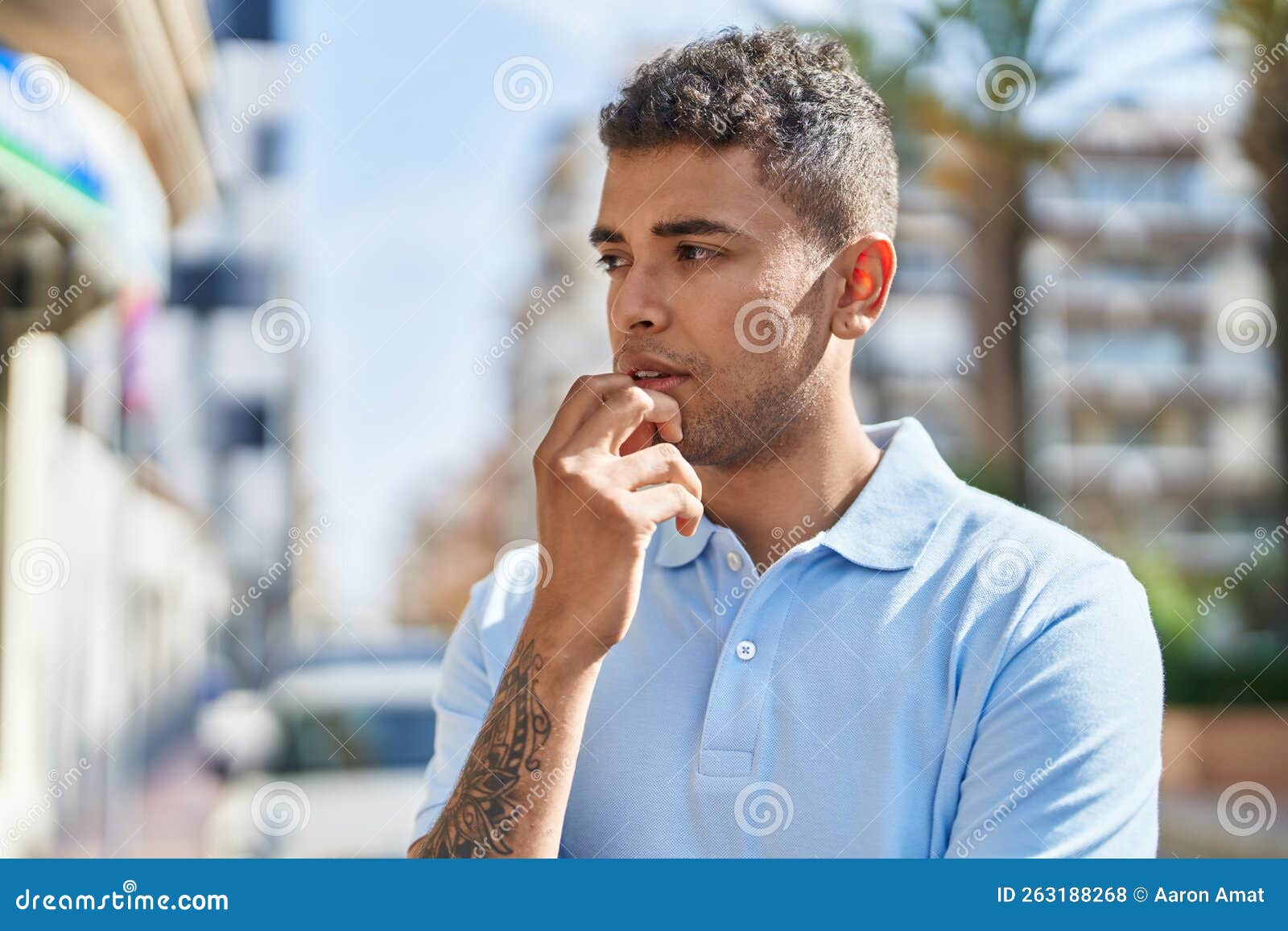 African American Man Standing with Doubt Expression at Street Stock ...