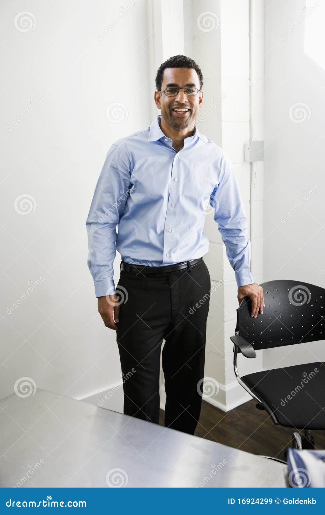 African American Man Standing in Office Stock Image - Image of standing ...
