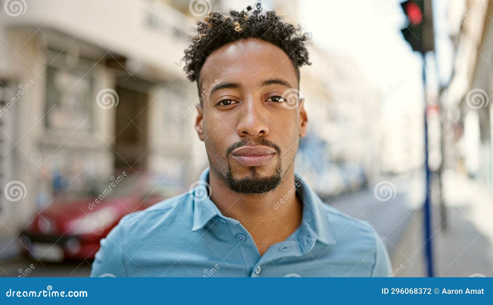 African American Man Standing with Serious Expression at Street Stock ...