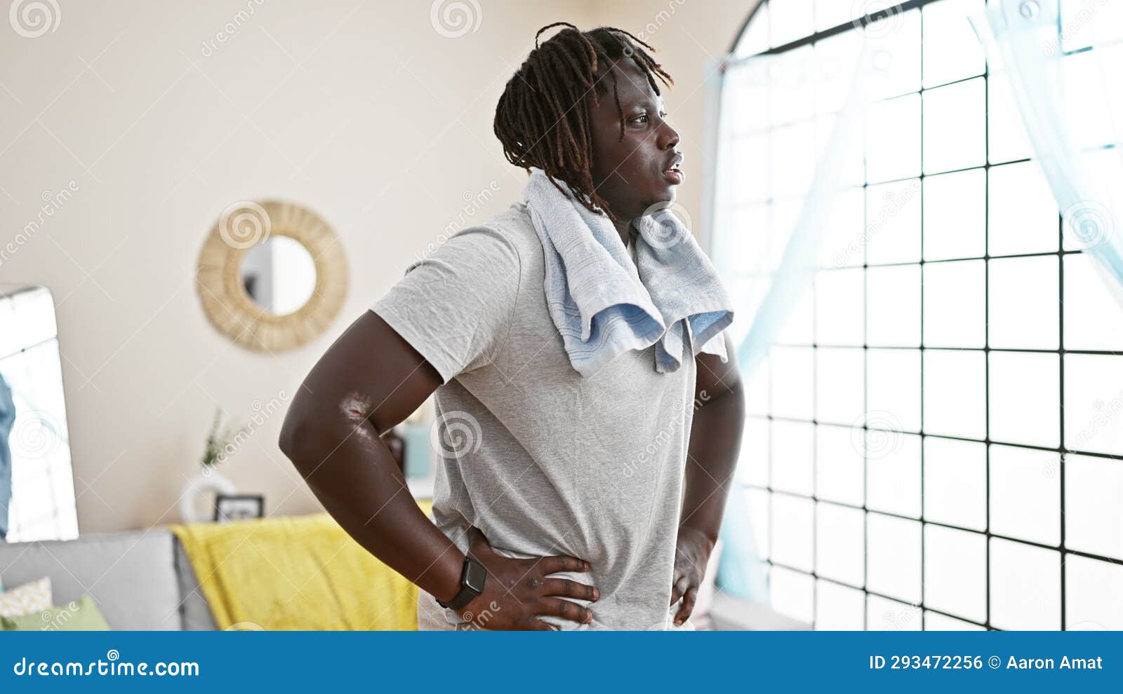 African American Man Standing with Serious Face Sweating at Home Stock ...