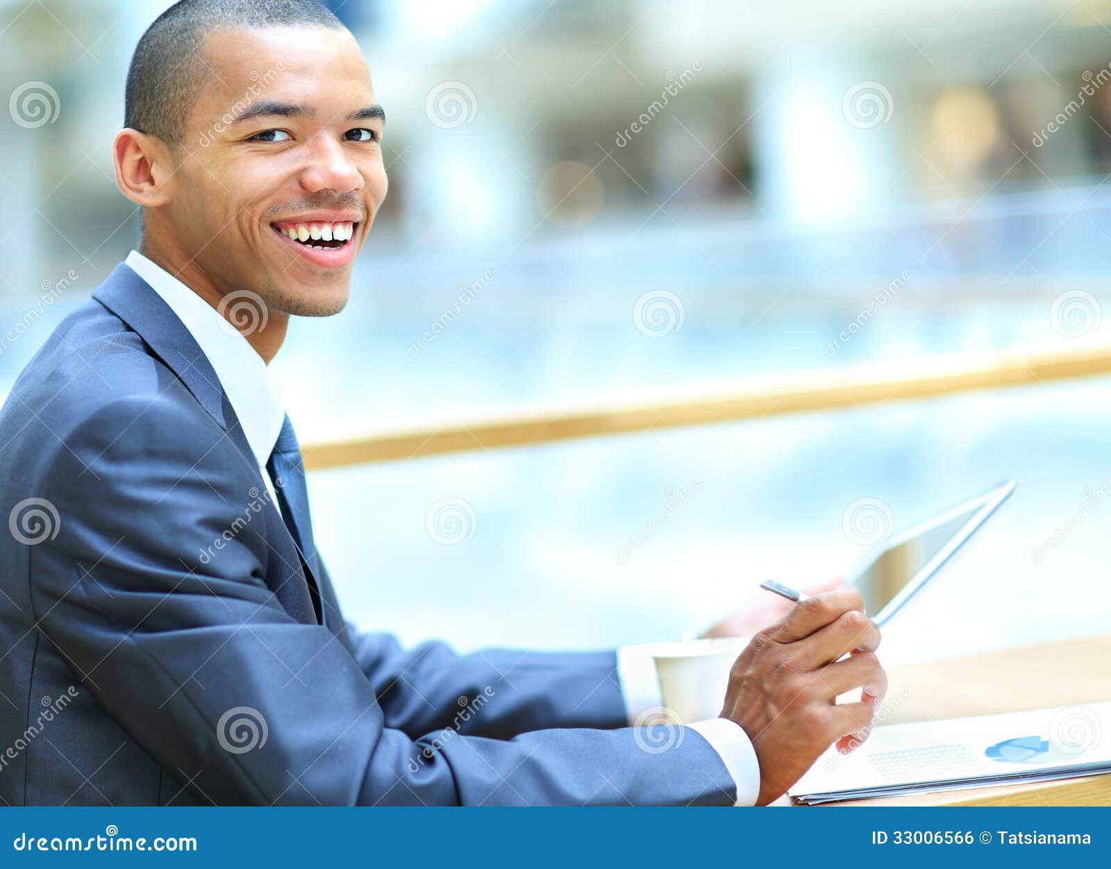 African American Man with Tablet Computer in Modern Office Stock Photo ...
