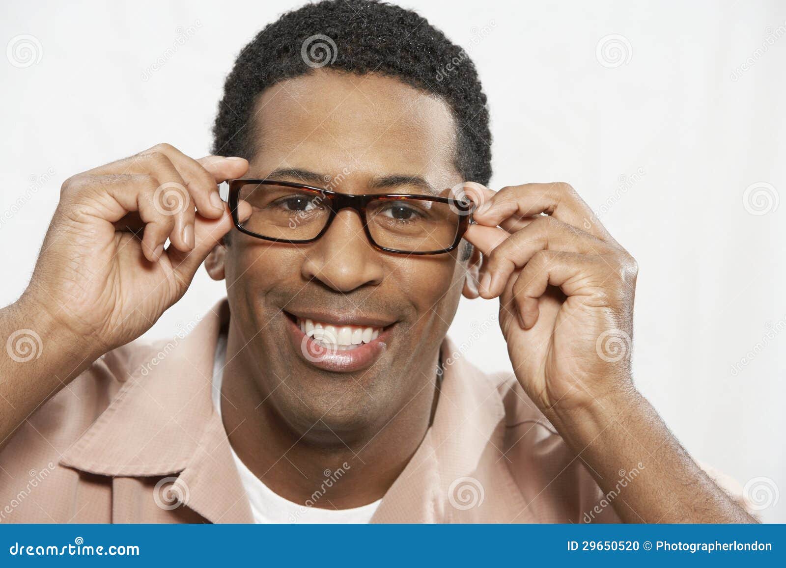 African American Man Trying on Glasses Stock Photo - Image of ...