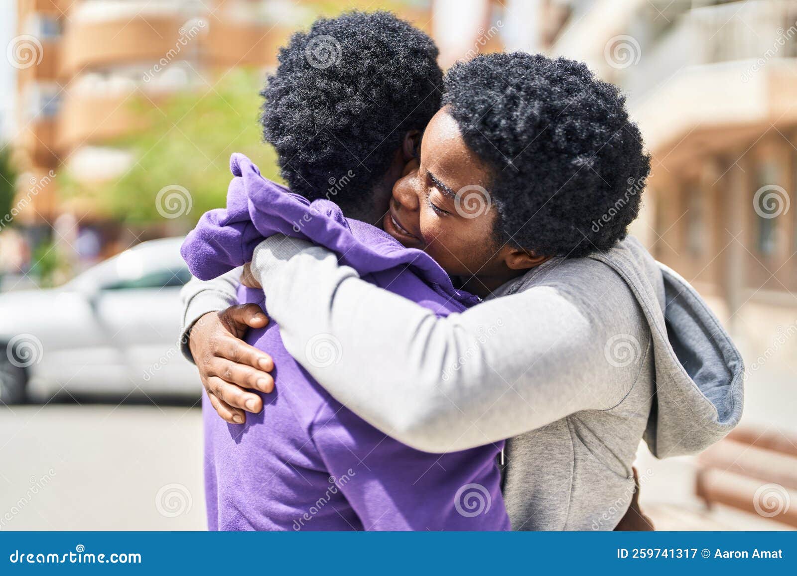 African American Man And Woman Couple Smiling Confident Hugging Each