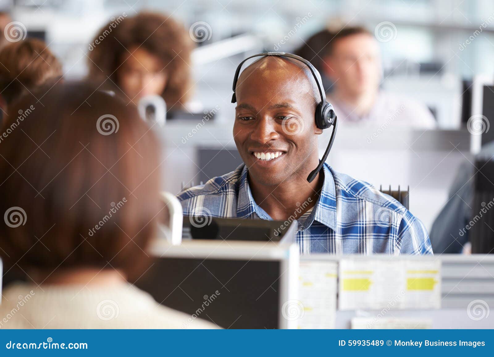 African American Man Working at a Computer in a Call Centre Stock Image ...