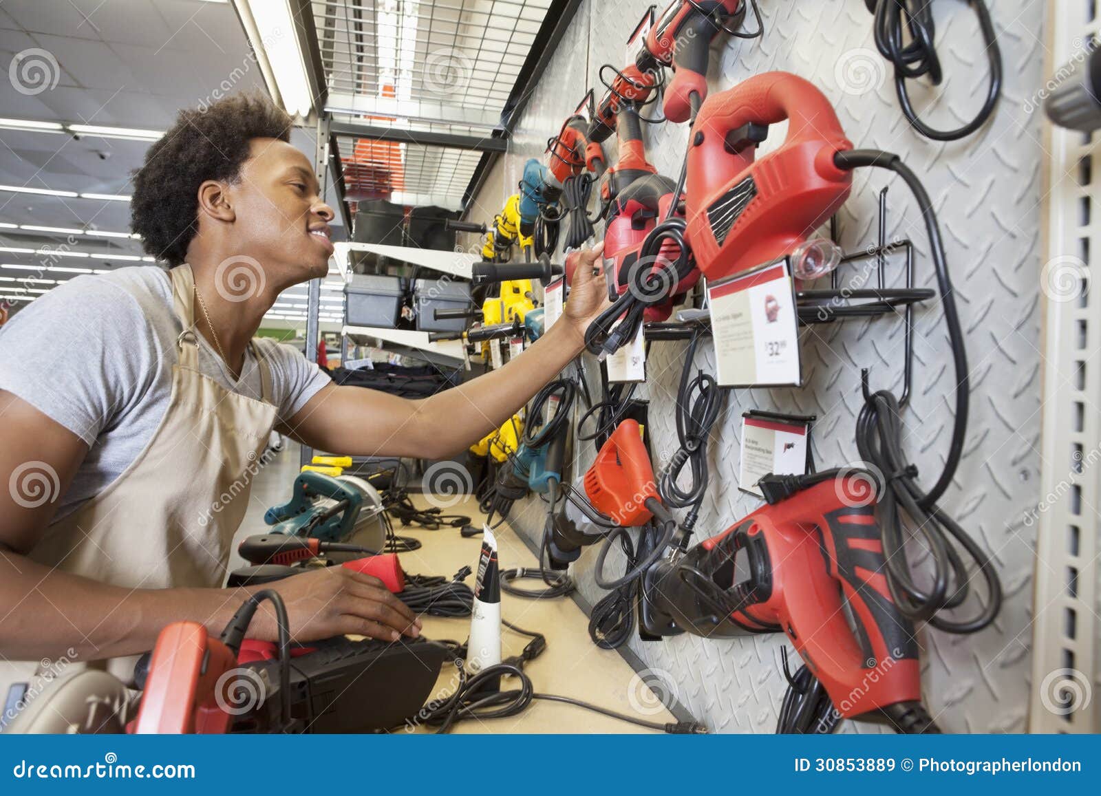 African American Man Working in an Electronics Store Stock Image ...