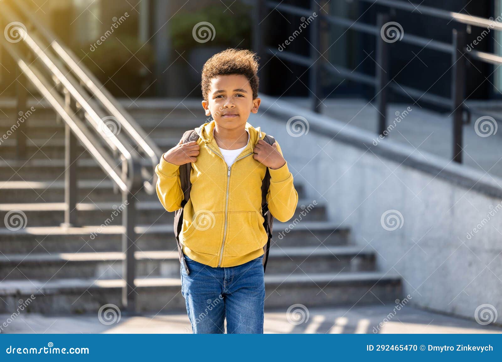 African American Schoolboy with a Backpack on the Stairs Stock Photo ...