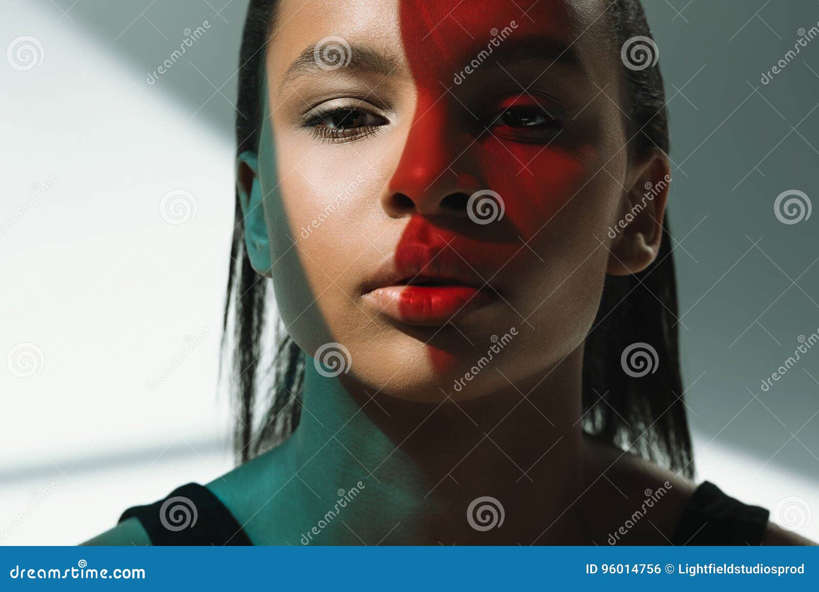 African American Seductive Stylish Model with Red Shadow on Face ...
