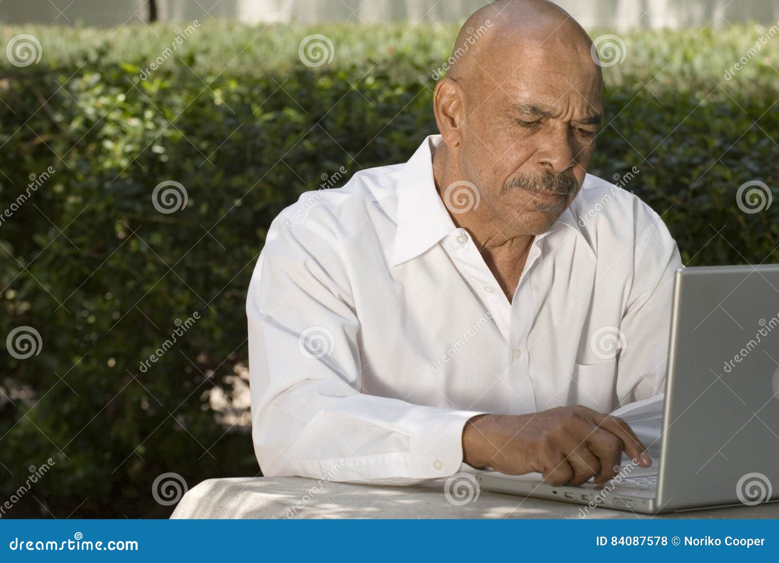 African American Senior Citizen Working on Laptop Computer Stock Photo ... African American Senior Citizen Working on Laptop Computer Stock Photo ...