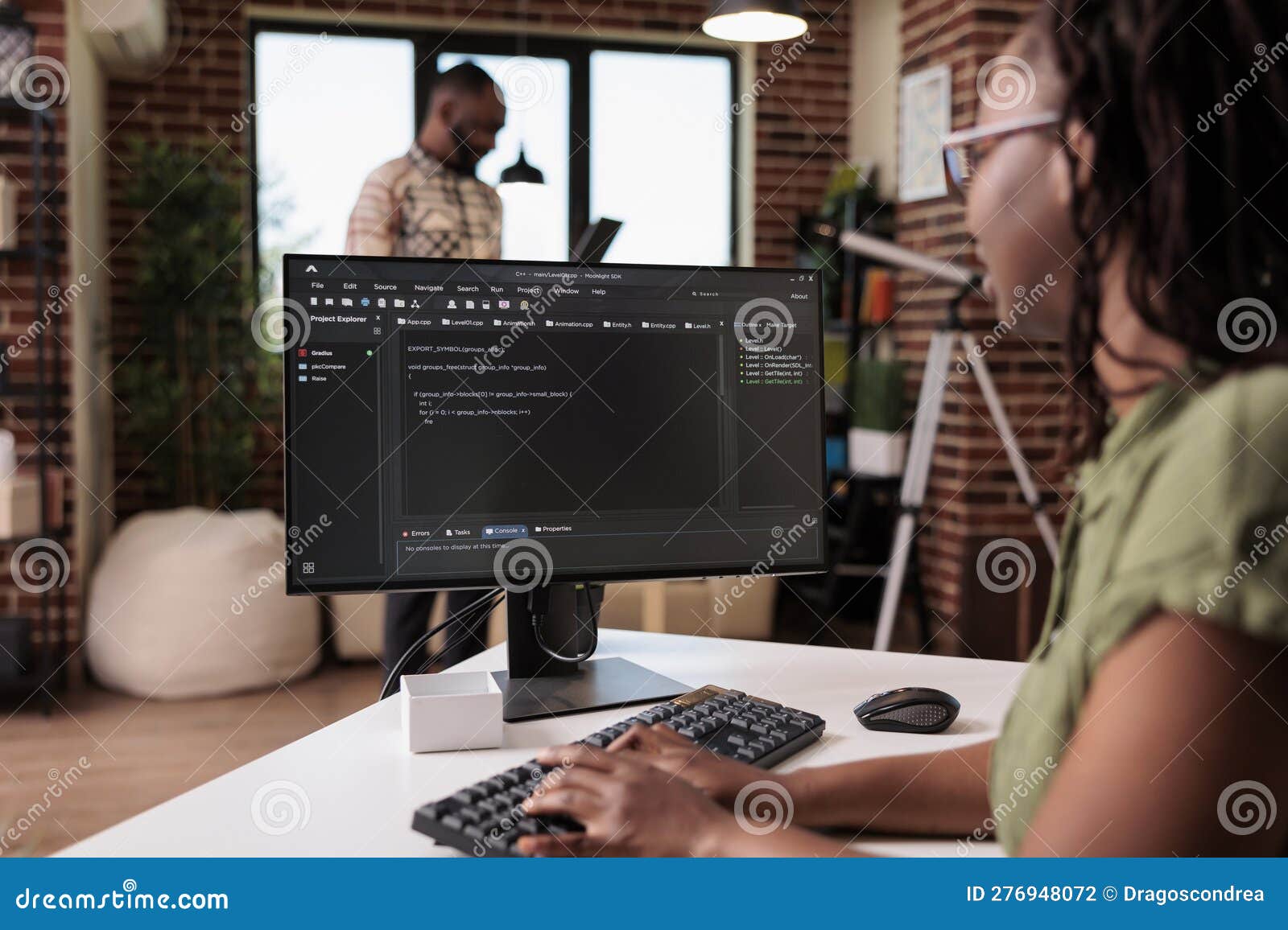African American Software Developer Debugging Source Code Algorithm