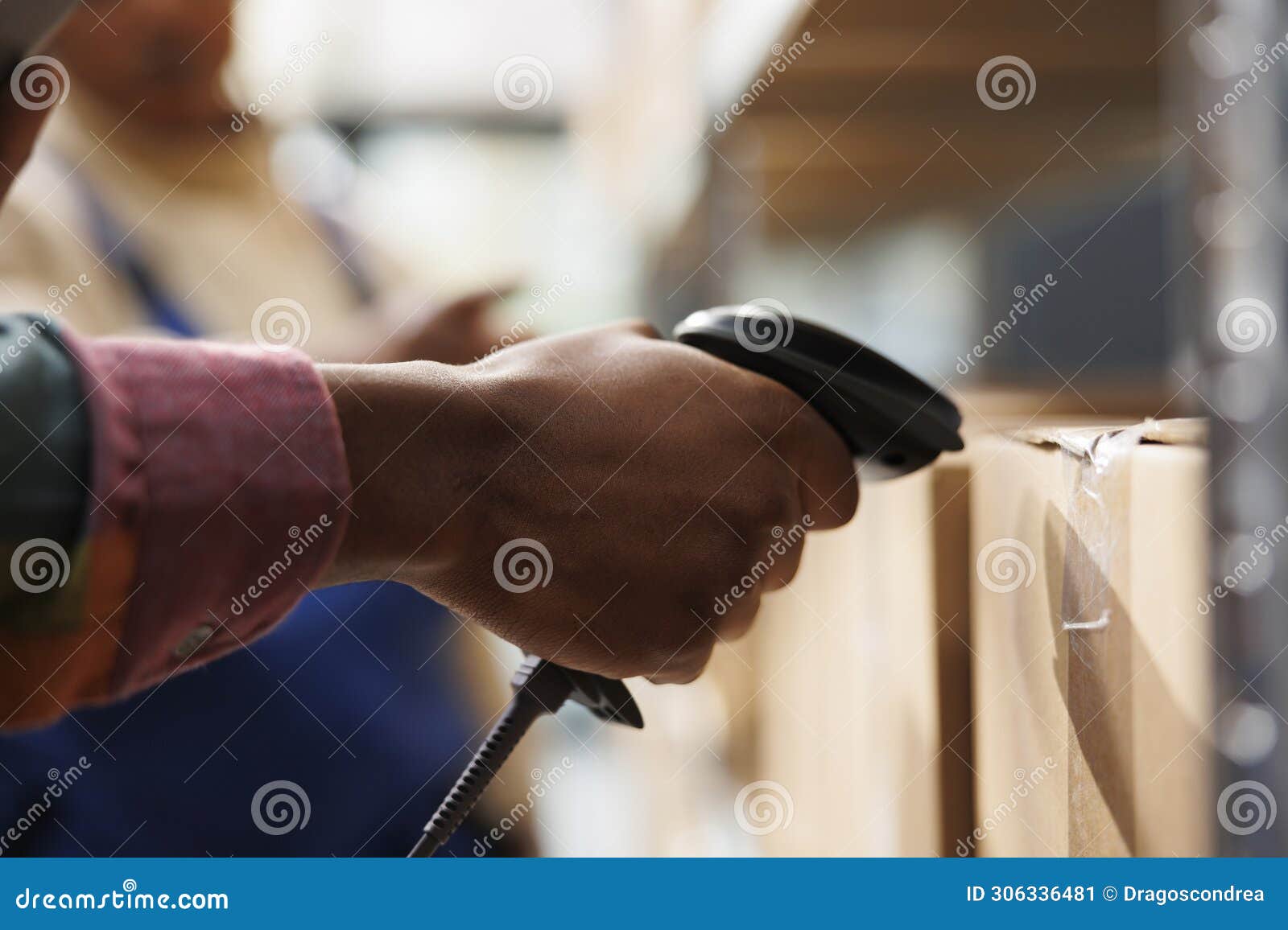 African American Storehouse Employee Arm Using Barcode Scanner Stock ...