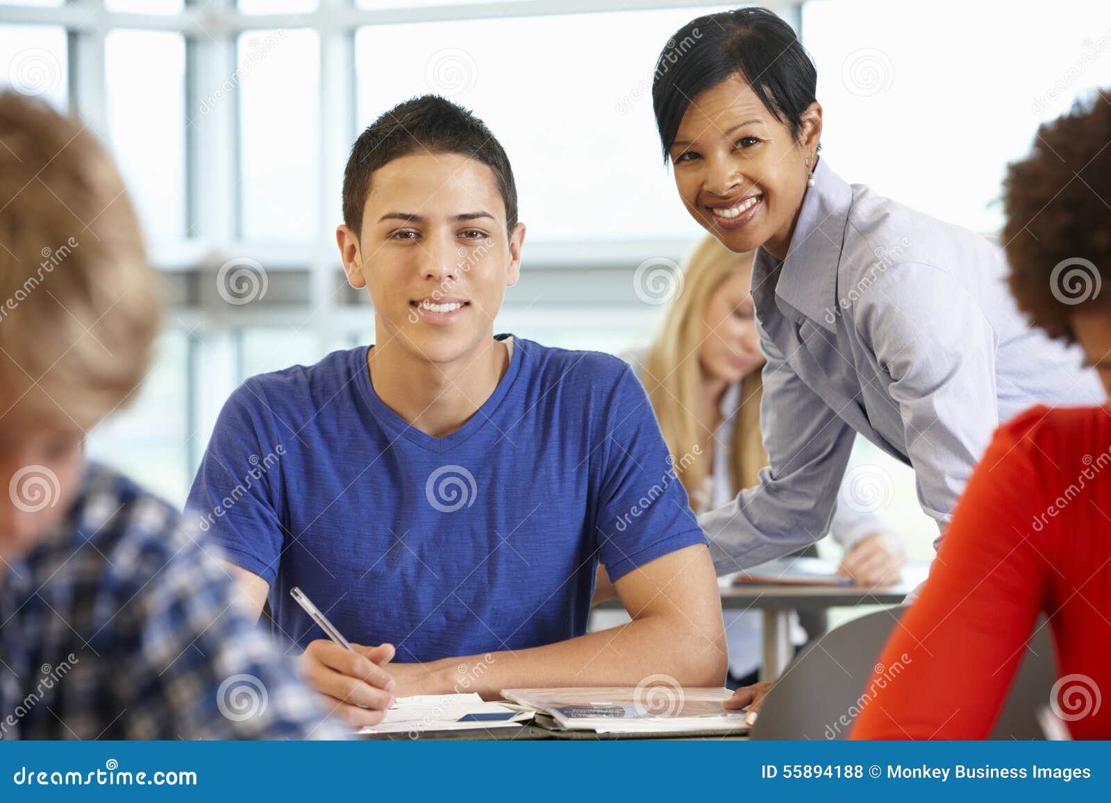 African American Teacher in Class with Students Stock Photo - Image of ...