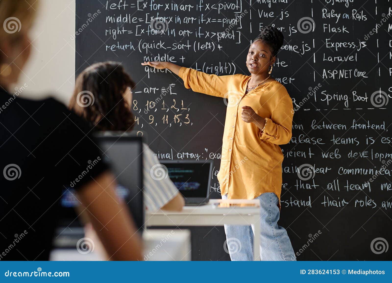 Teacher Explaining Material To Students at Class Stock Image - Image of ...