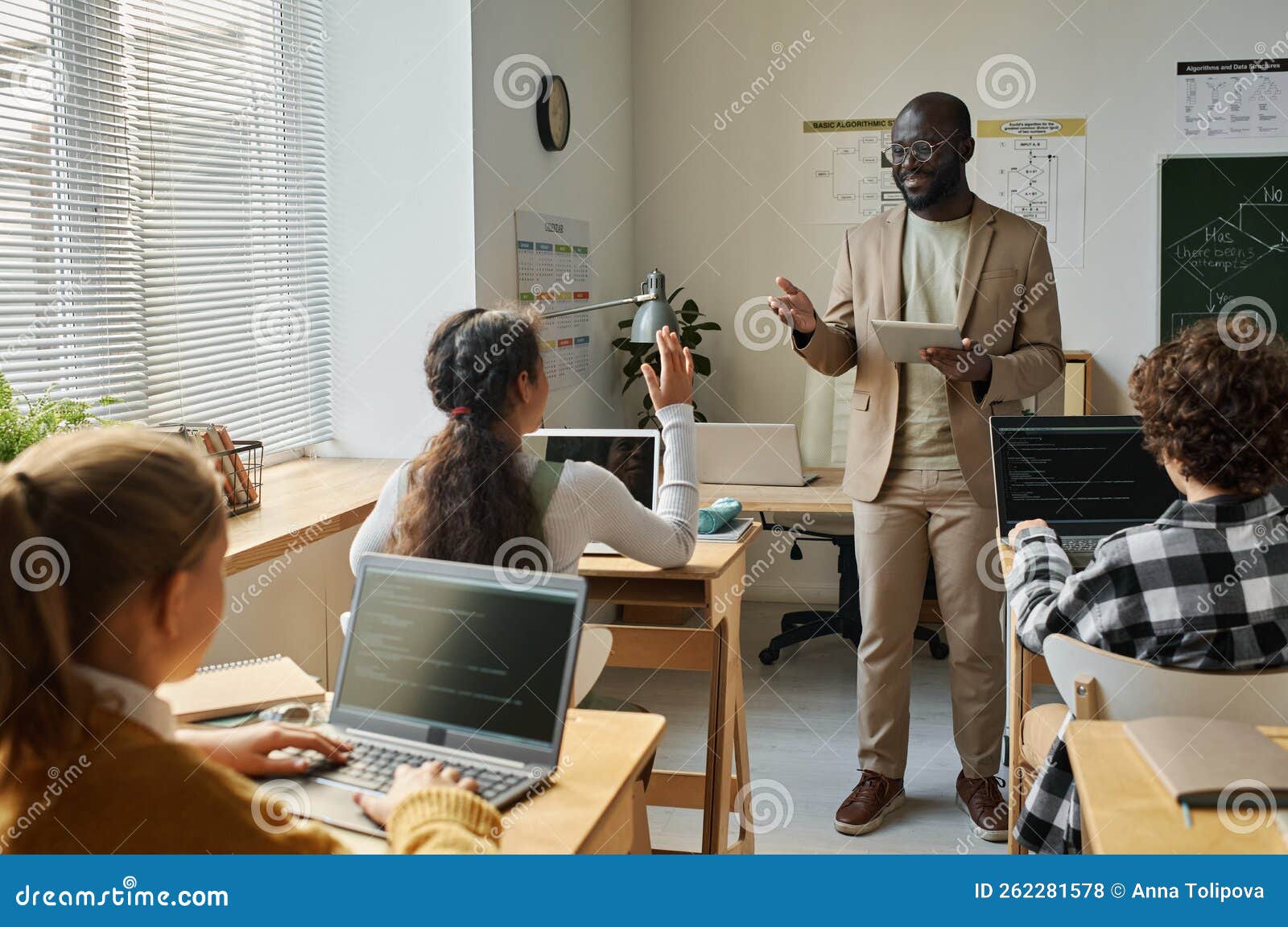 Teacher Teaching Children at Class Stock Photo - Image of elementary ...