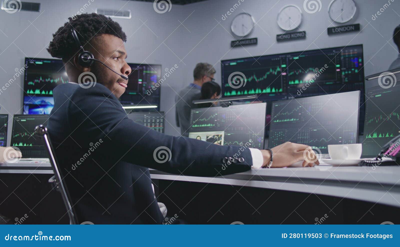 African American Trader Makes Notes and Works Stock Video - Video of ...