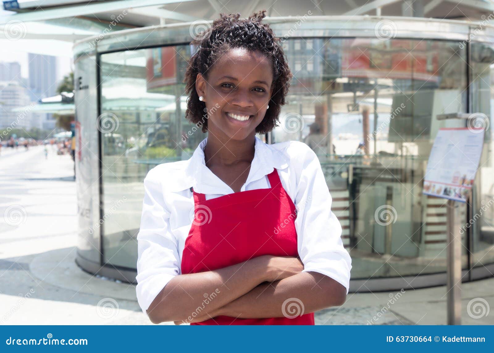 African American Waitress in Front of the Restaurant Stock Photo ...