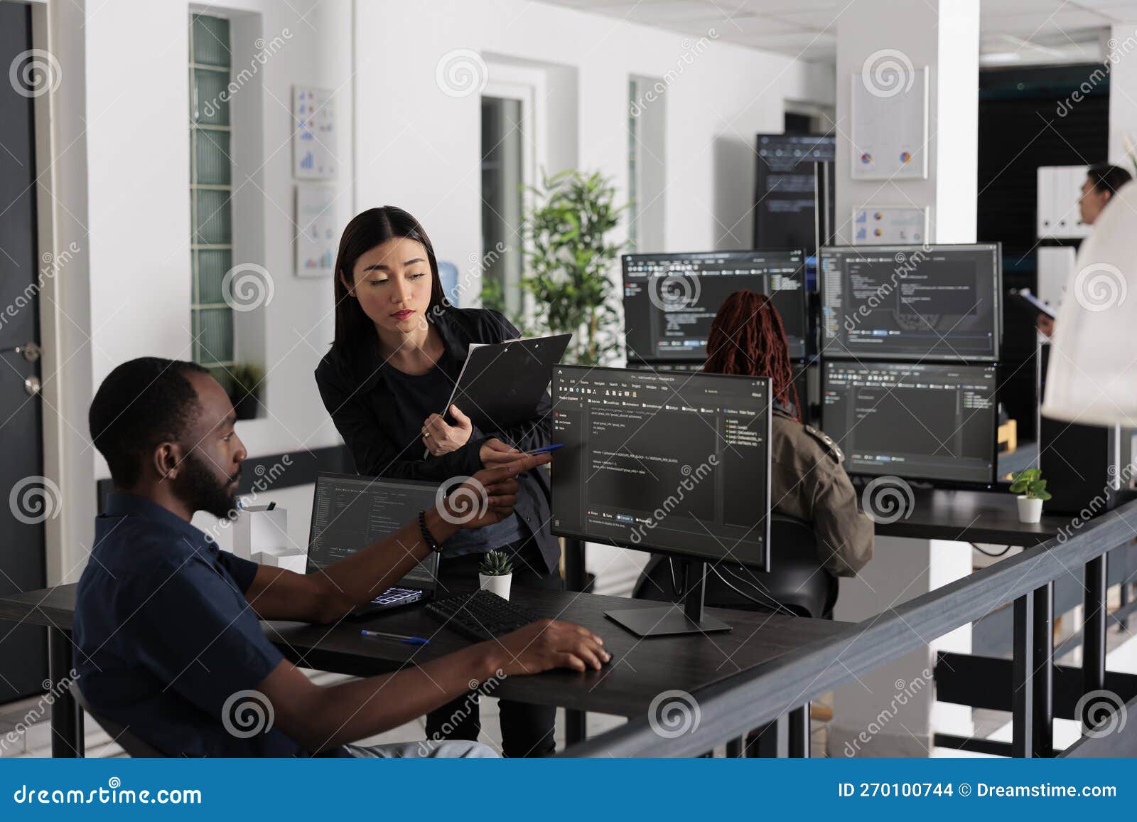 African American Web Developer Using Computer To Write Code and Develop ... African American Web Developer Using Computer To Write Code and Develop ...