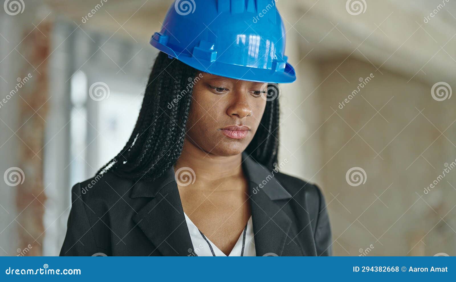 African American Woman Architect Standing with Relaxed Expression at ...