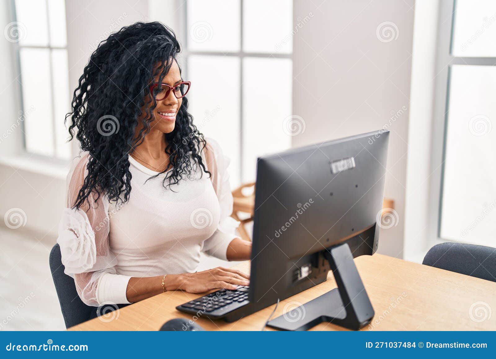 African American Woman Business Worker Using Computer Working at Office ...