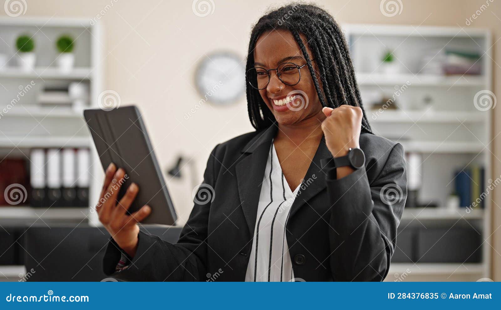 African American Woman Business Worker Using Touchpad with Winner ...