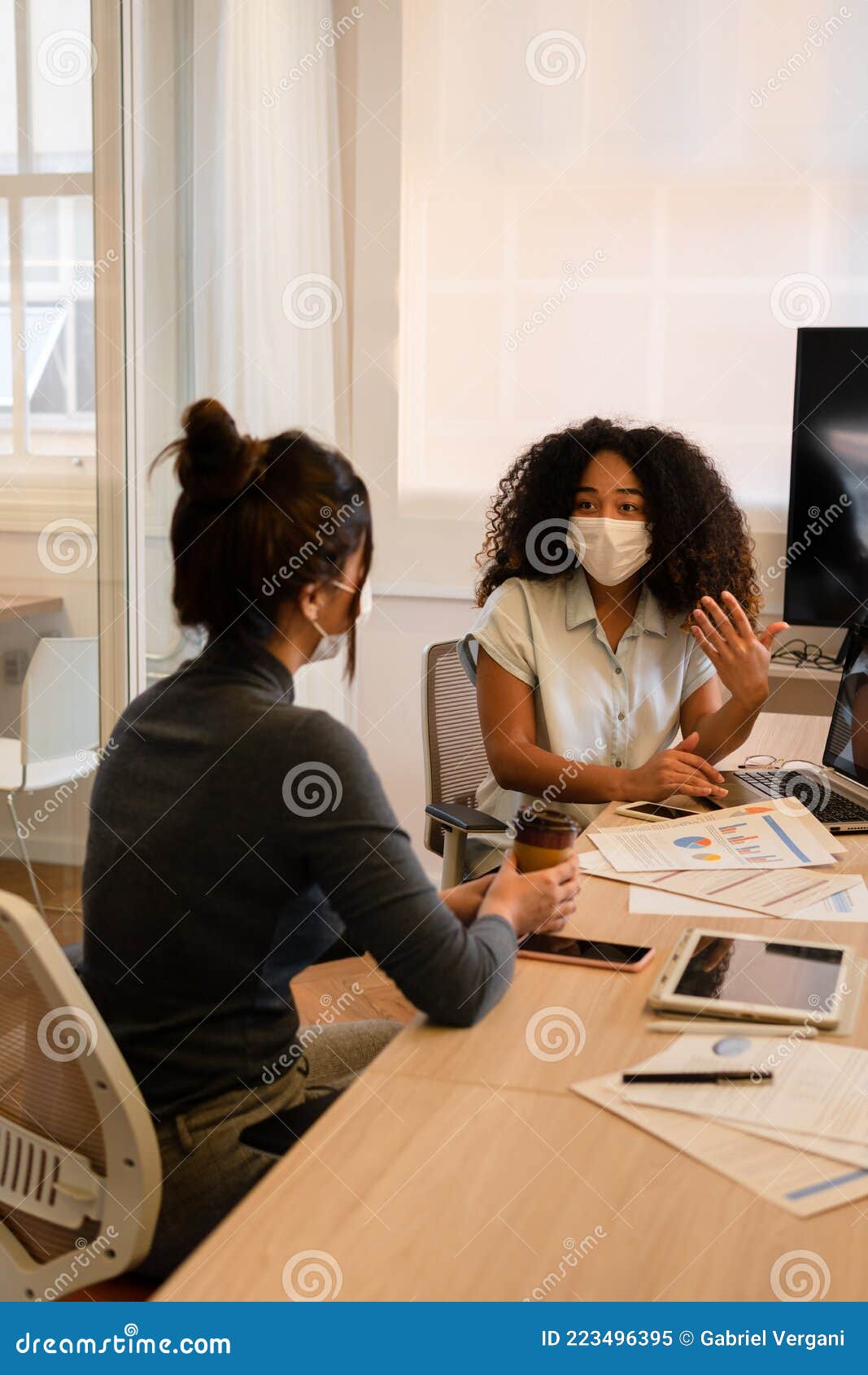 Woman Explaining Project Details To Colleague Stock Image - Image of ...