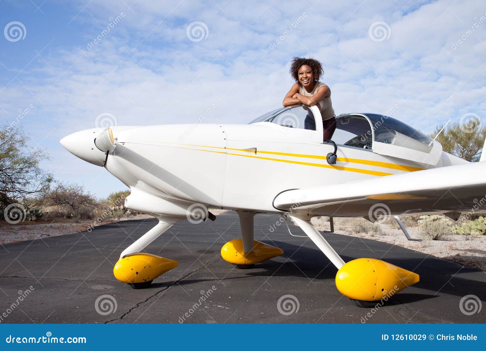 African American Woman Flying a Private Plane Stock Image - Image of ...