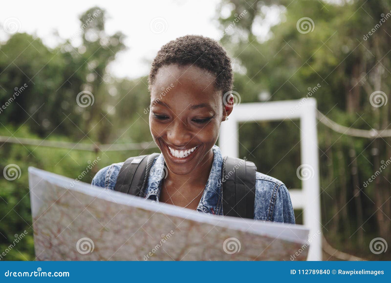 African American Woman Looking at a Map Stock Photo - Image of leisure ...