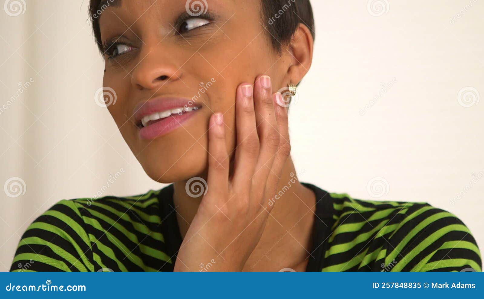 African American Woman Making Faces and Looking Off Camera Stock Video ...