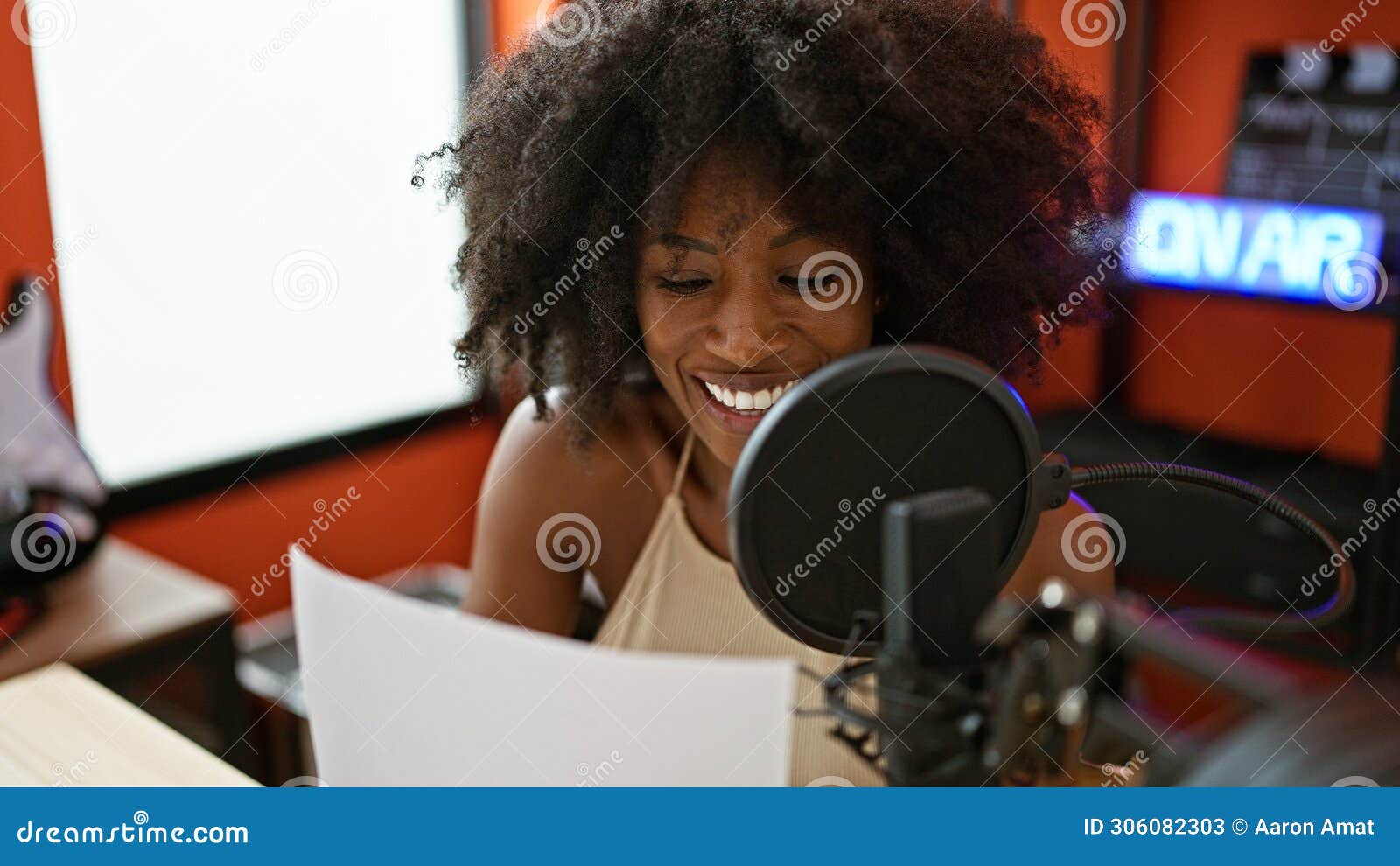 African American Woman Radio Reporter Reading Script Working at Radio ...