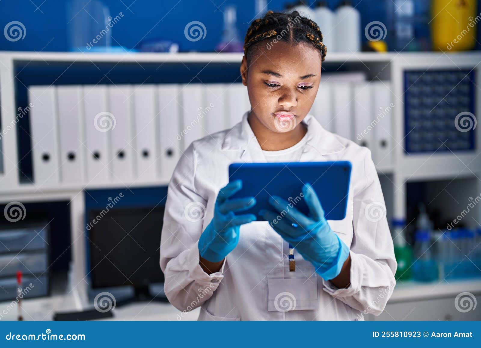 African American Woman Scientist Using Touchpad at Laboratory Stock ...