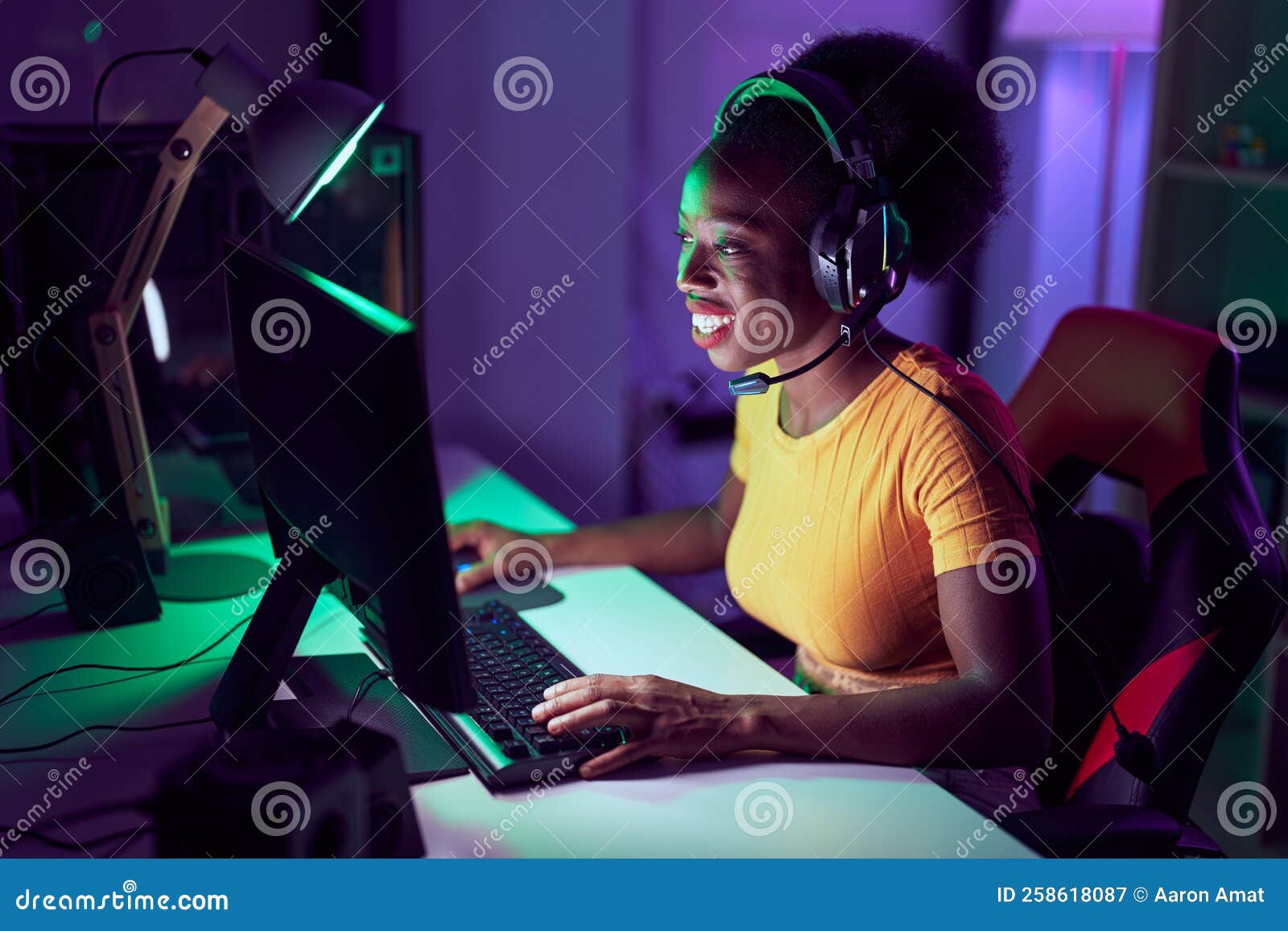 African American Woman Streamer Using Computer at Gaming Room Stock ...