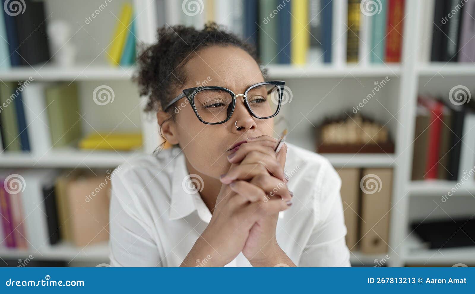 African American Woman Student Standing with Doubt Expression at ...