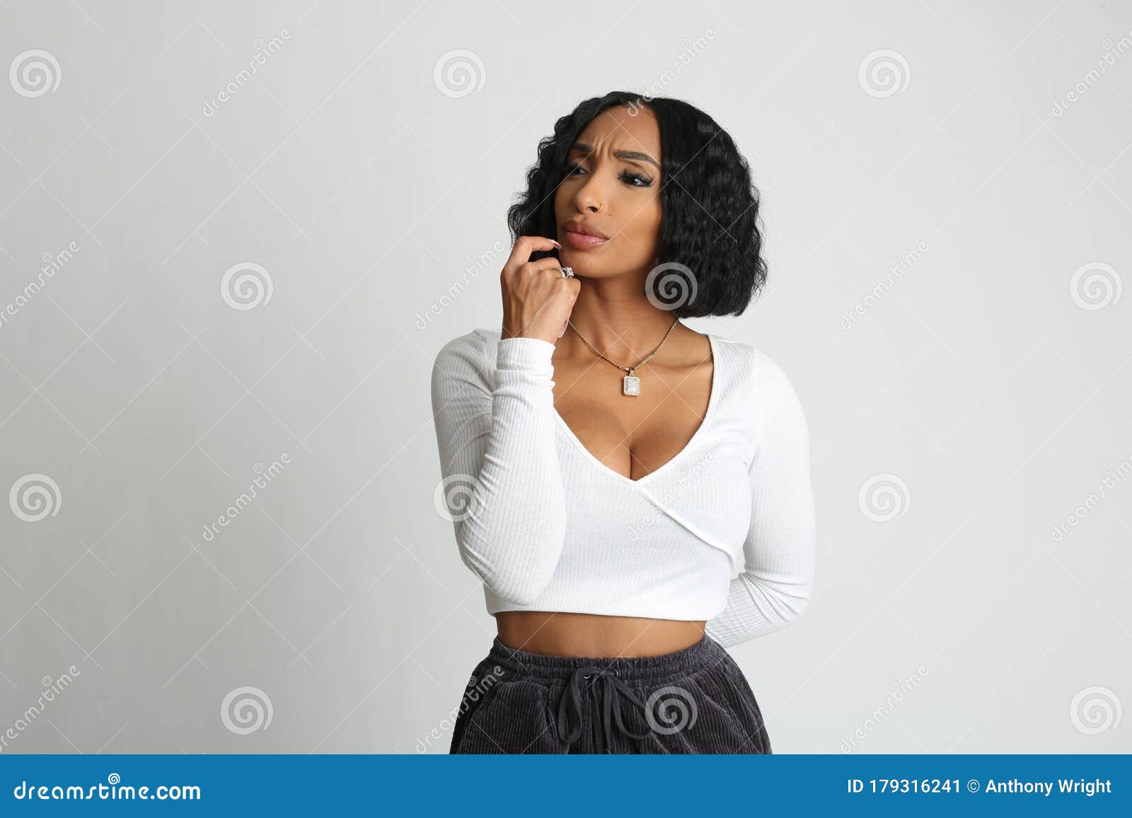 African American Woman Thinking on a White Back Ground Stock Image ...