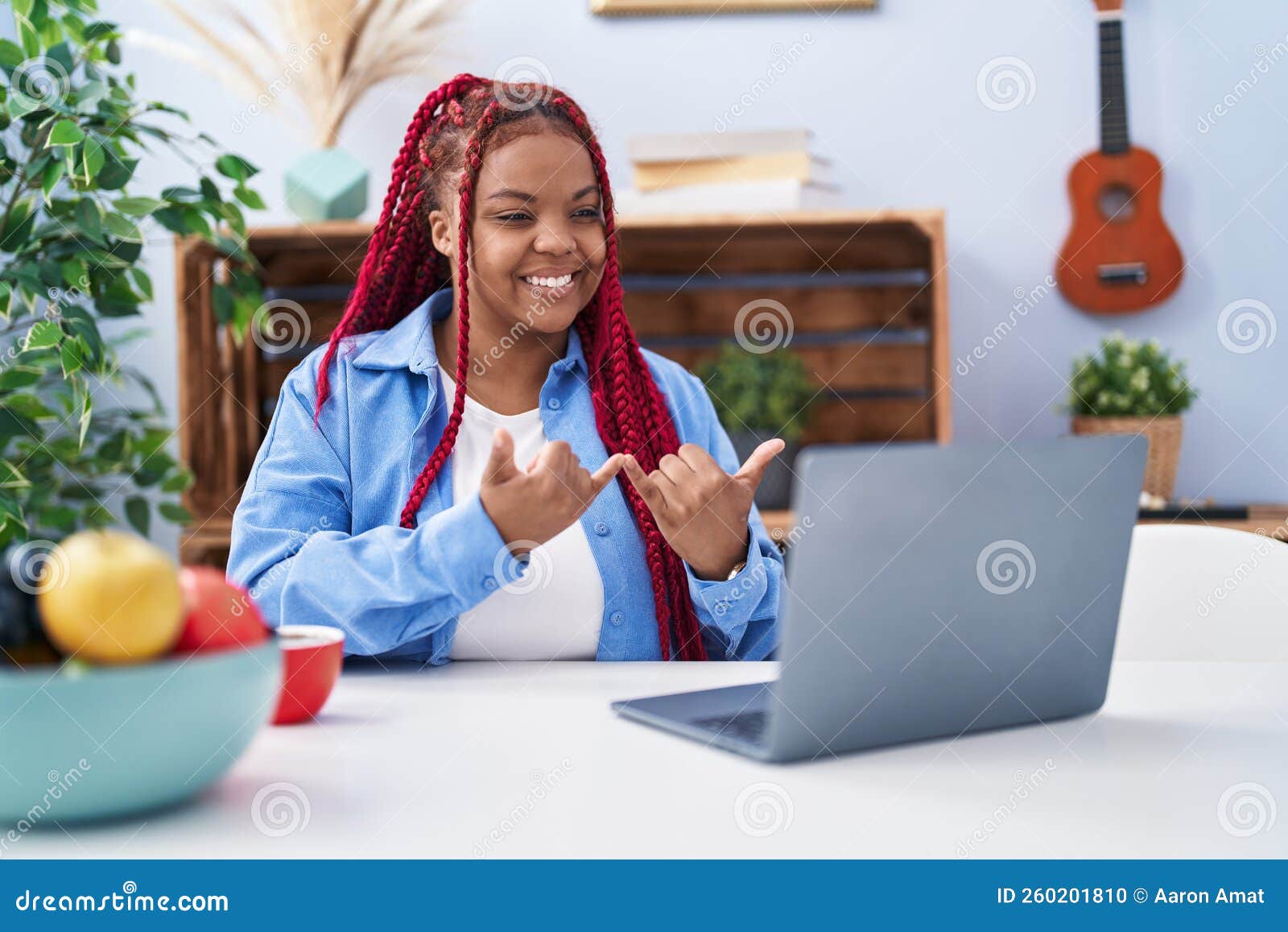 African American Woman Using Laptop Communicate with Deaf Language at ...