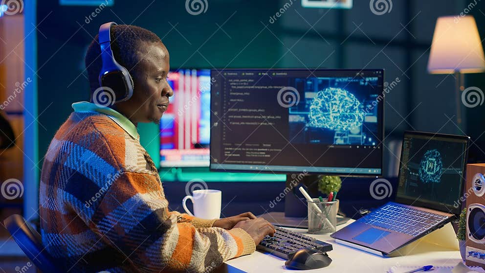 African American Worker at Desk Using Personal Computer for Programming Stock Image - Image of ...
