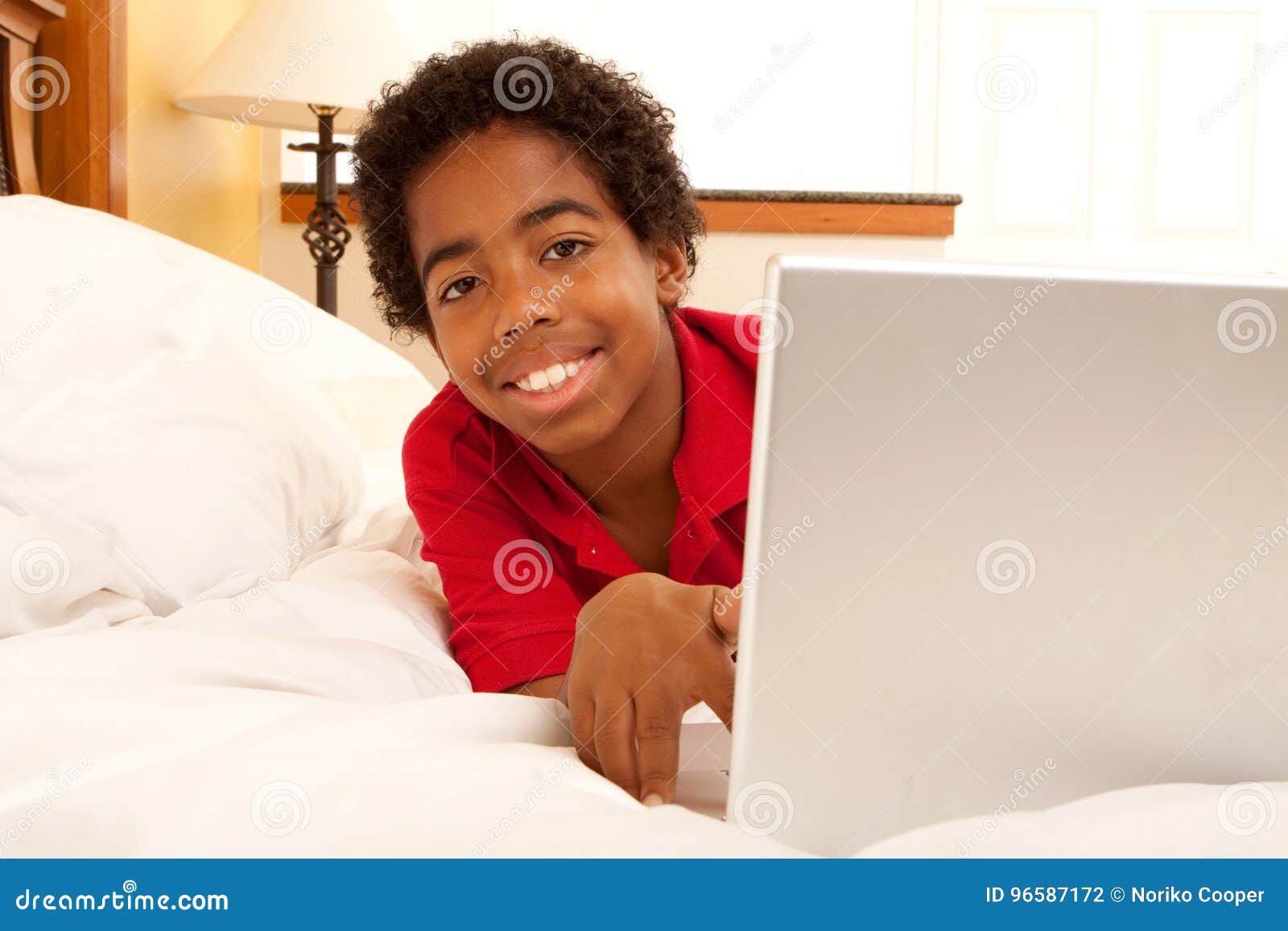 African American Young Boy on the Computer. Stock Photo - Image of ...