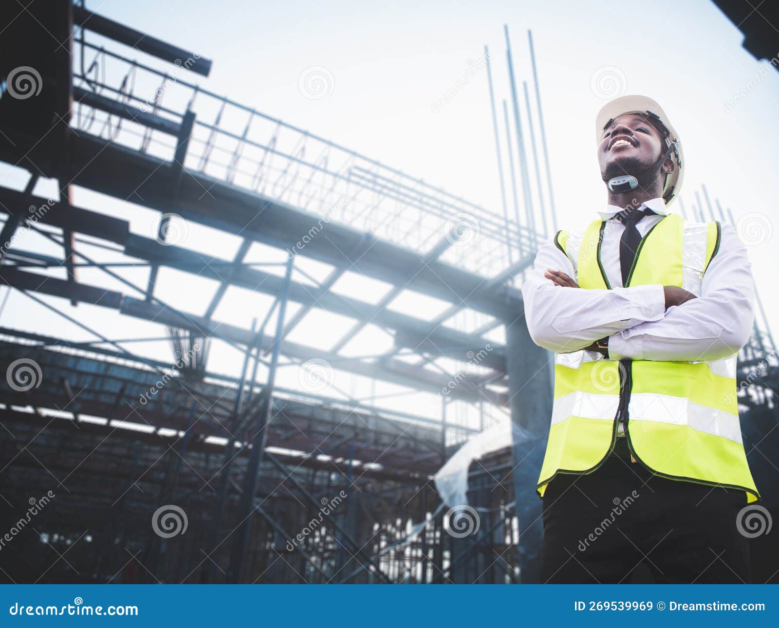 African Architects Engineer Man with Hardhat Work Together in the ...