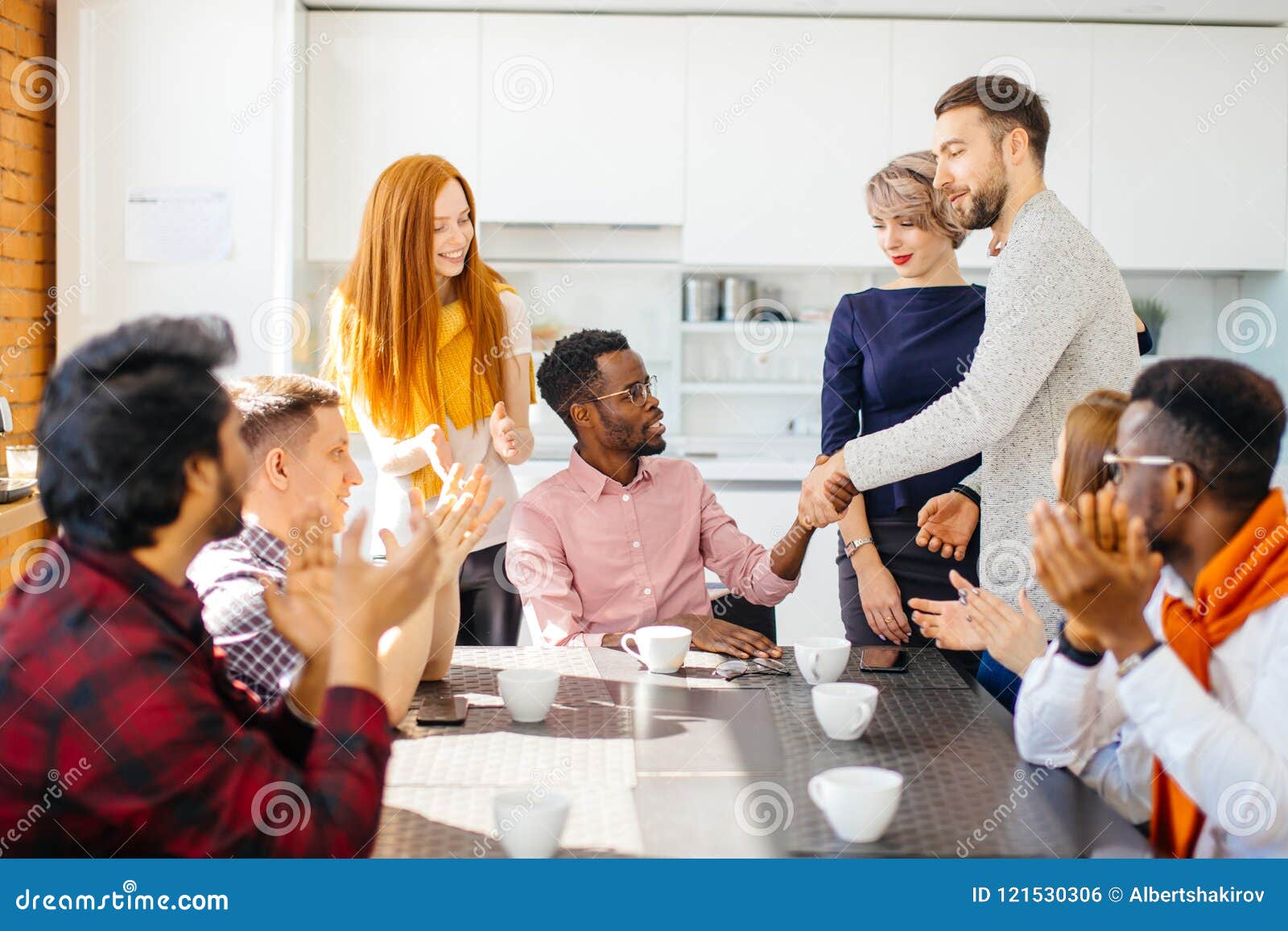 African Boss is Congratulating His Talented Worker in Front of ...