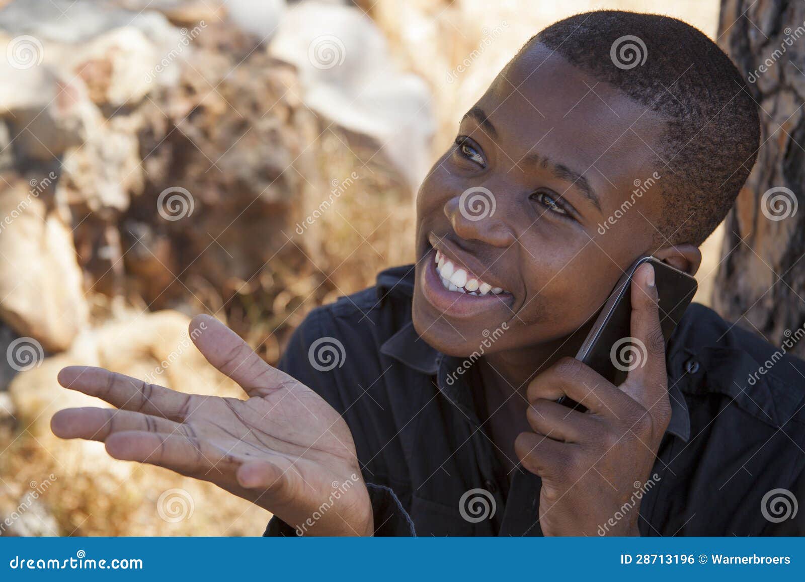 African boy on cell phone stock photo. Image of outside - 28713196