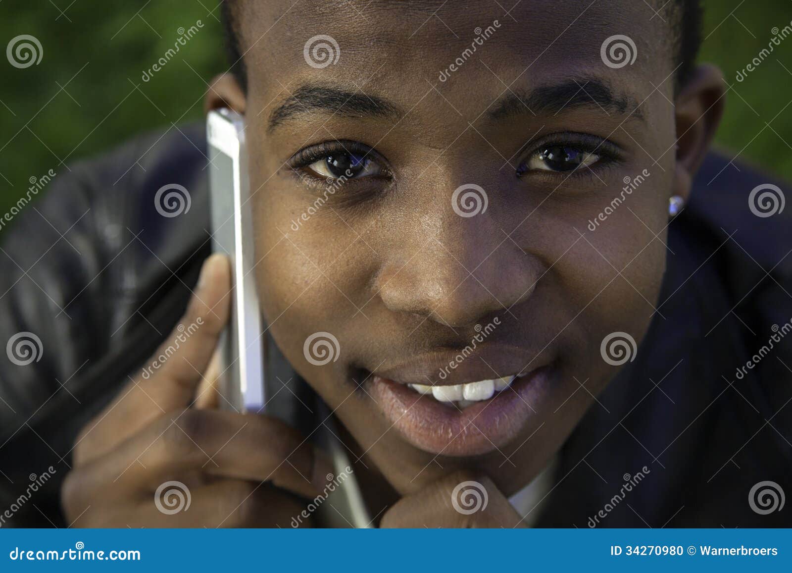 African Boy on Cell Phone Outside Stock Photo - Image of tshirt ...