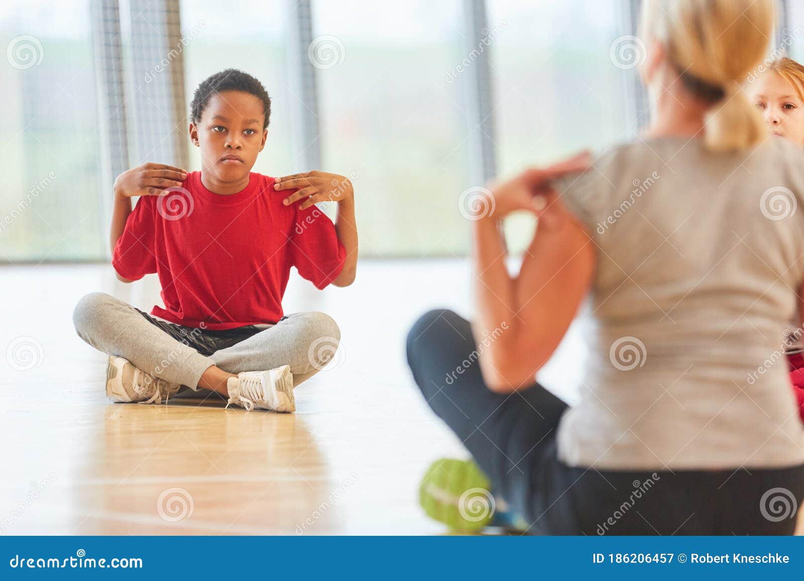 African Boy is Doing a Stretching Exercise Stock Image - Image of pupil ...