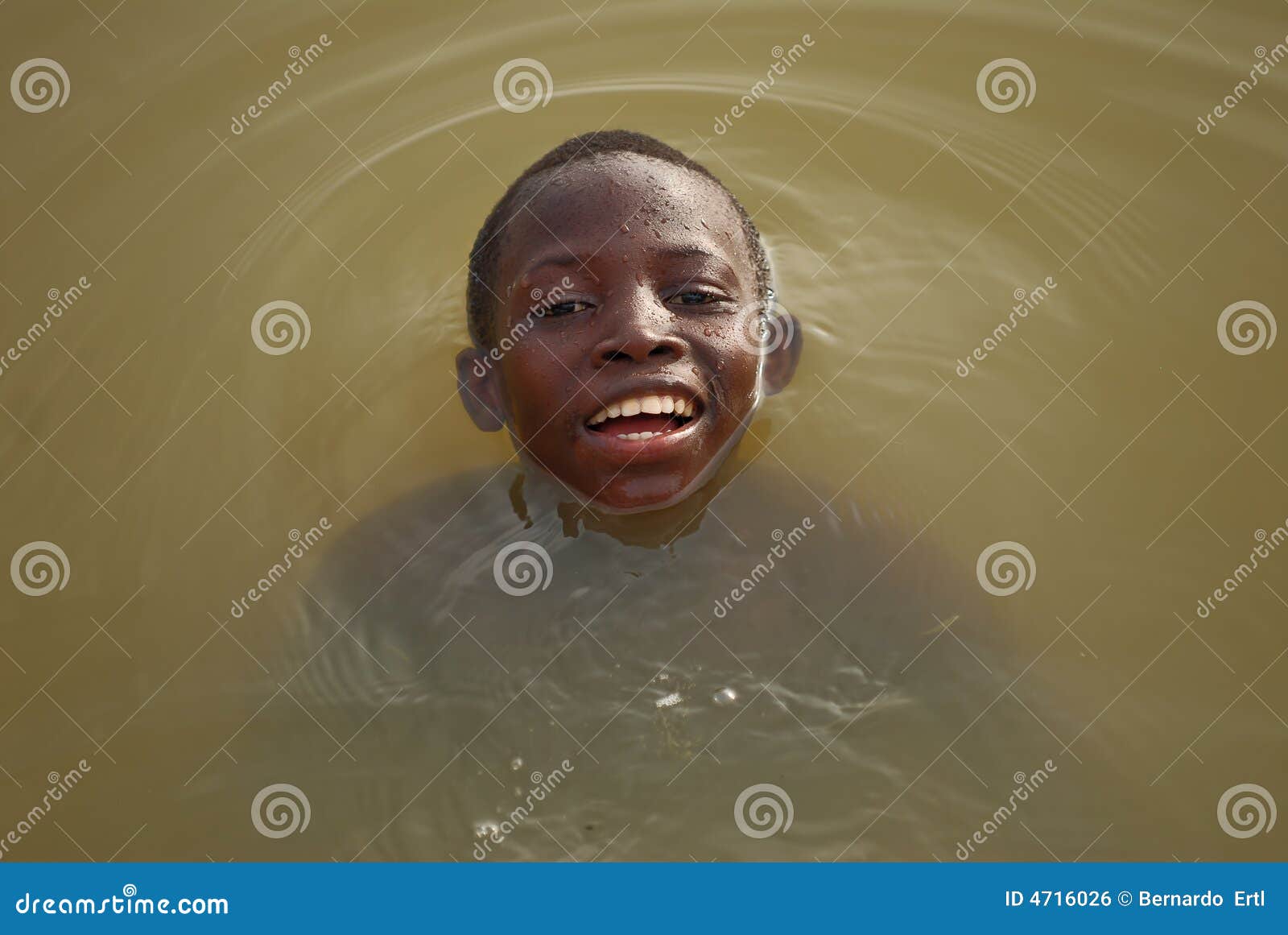 African boy in river editorial photo. Image of ripple - 4716026