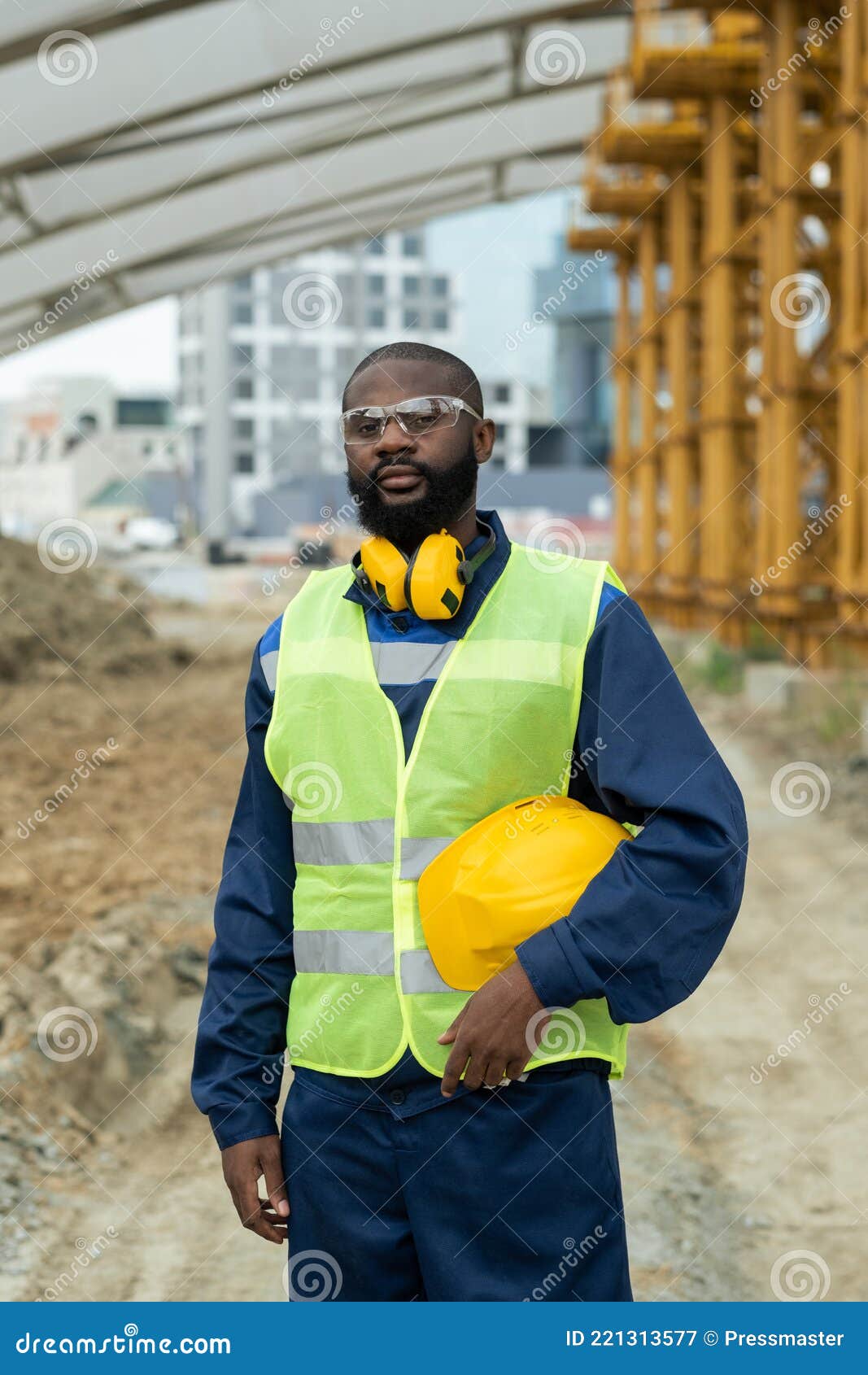 African Builder in Uniform Standing on Construction Site Stock Image ...