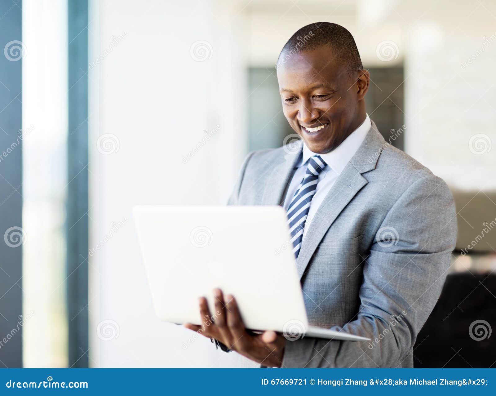 African Business Man Laptop Stock Image - Image of indoors, adult: 67669721